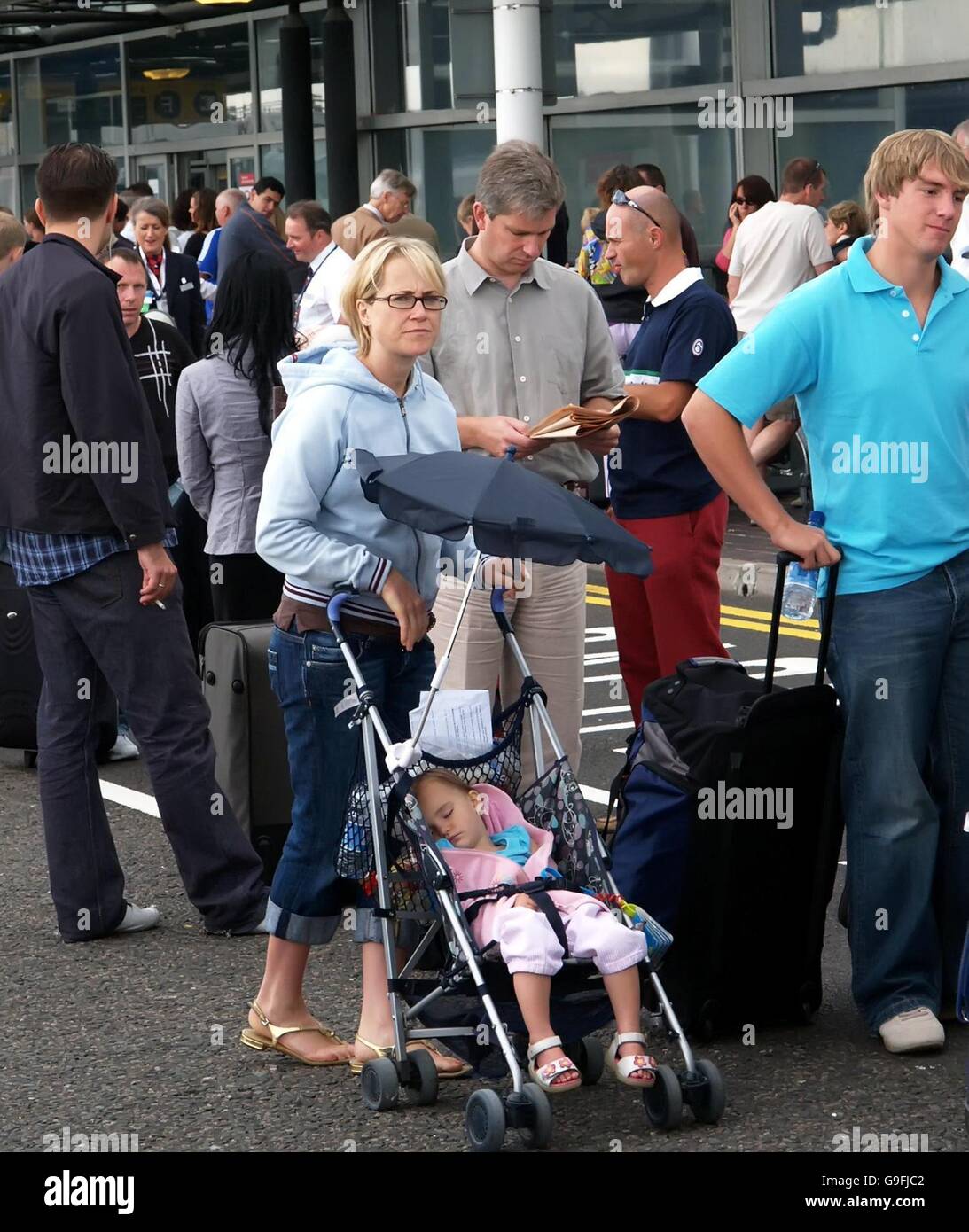 Passengers waiting outside the departure hall of the Gatwick North ...