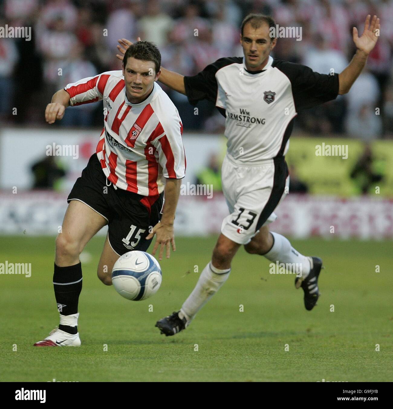 Gretna's James McQuilken (right) in action with Derry City's Kevin ...