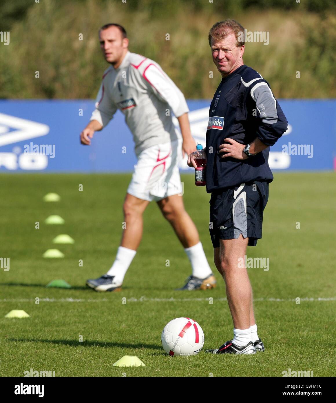 England coach Steve McClaren as Dean Ashton looks on during a training ...