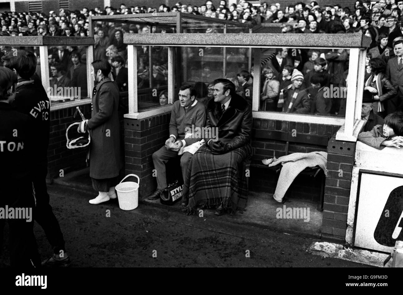 Leeds United manager Don Revie (r) and trainer Les Cocker (l) sit in ...