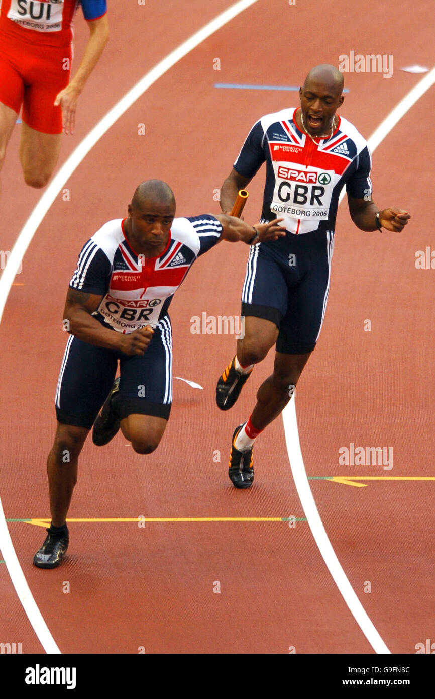 Great britains marlon devonish the baton to mark lewis francis hi-res ...