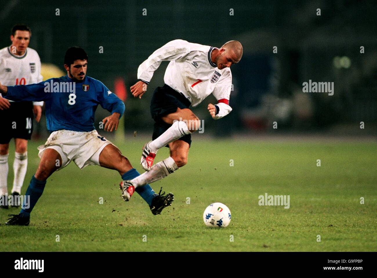 Englands david beckham is tackled by italys ivan gennaro gattuso hi-res ...