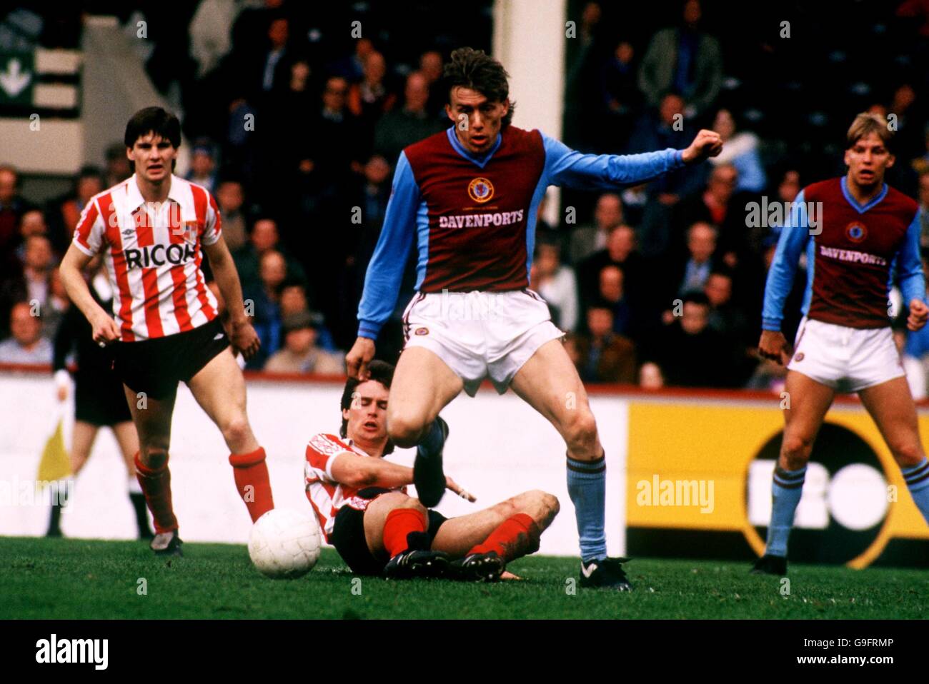 Aston Villa's Tony Morley (c) evades a tackle from Stoke City's David ...