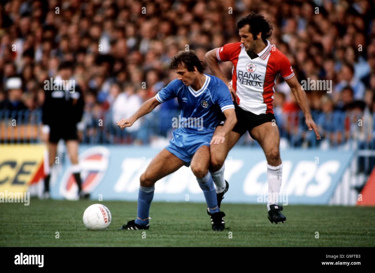 Manchester City's Trevor Francis (l) shields the ball from Southampton ...