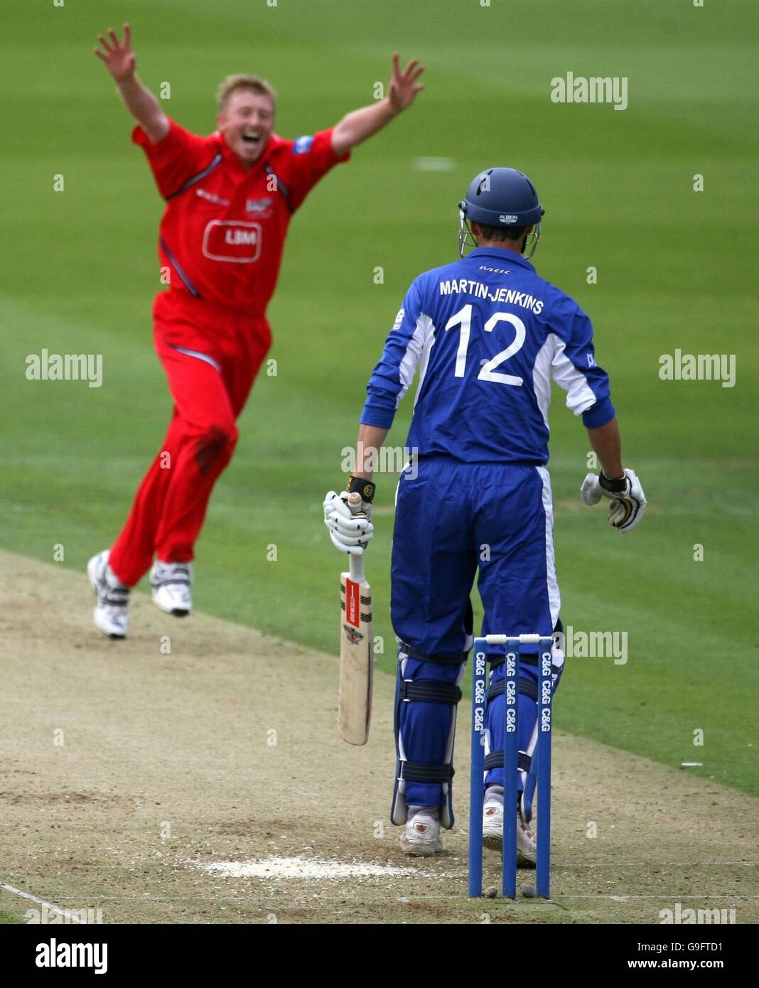 Sussex's Robin Martin-Jenkins is bowled by Lancashires Glen Chapple ...