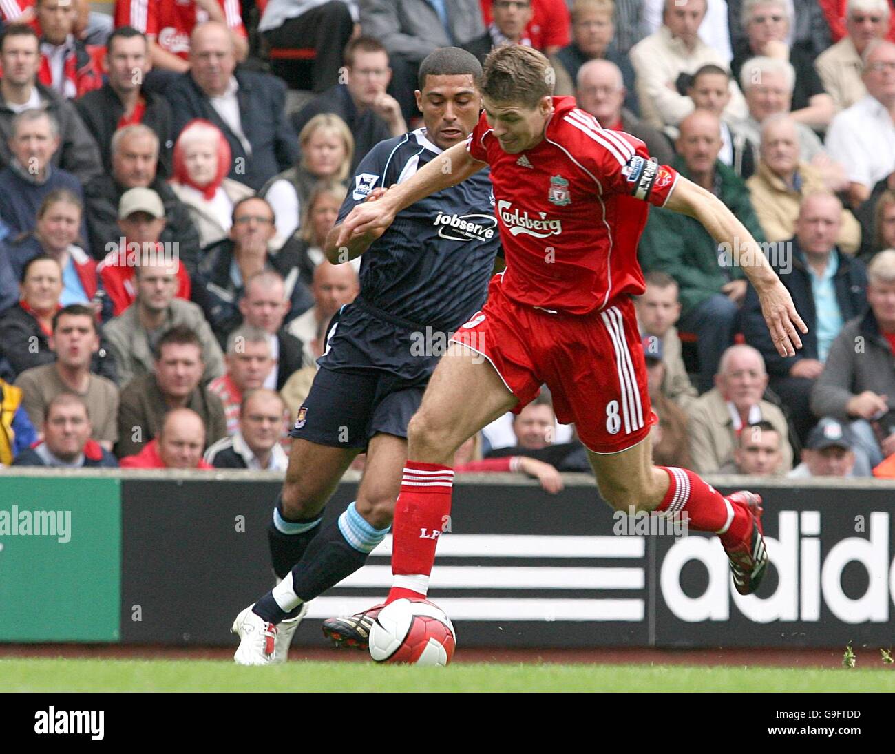 (L-R) West Ham United's Hayden Mullins and Liverpool's Steven Gerrard ...