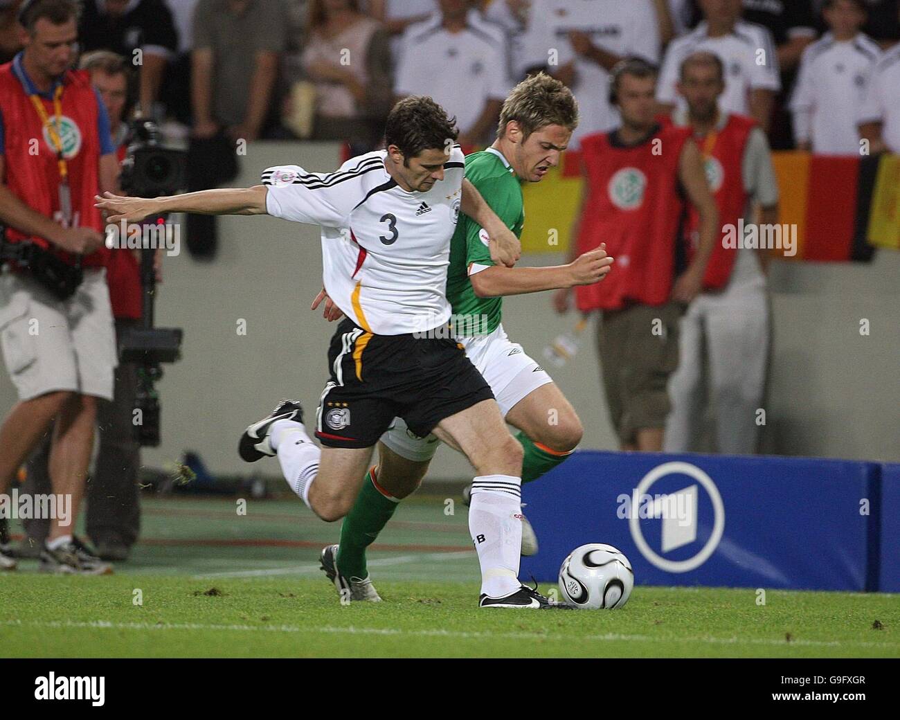 Republic of Ireland's Kevin Doyle is tackled by Germany's Arne ...