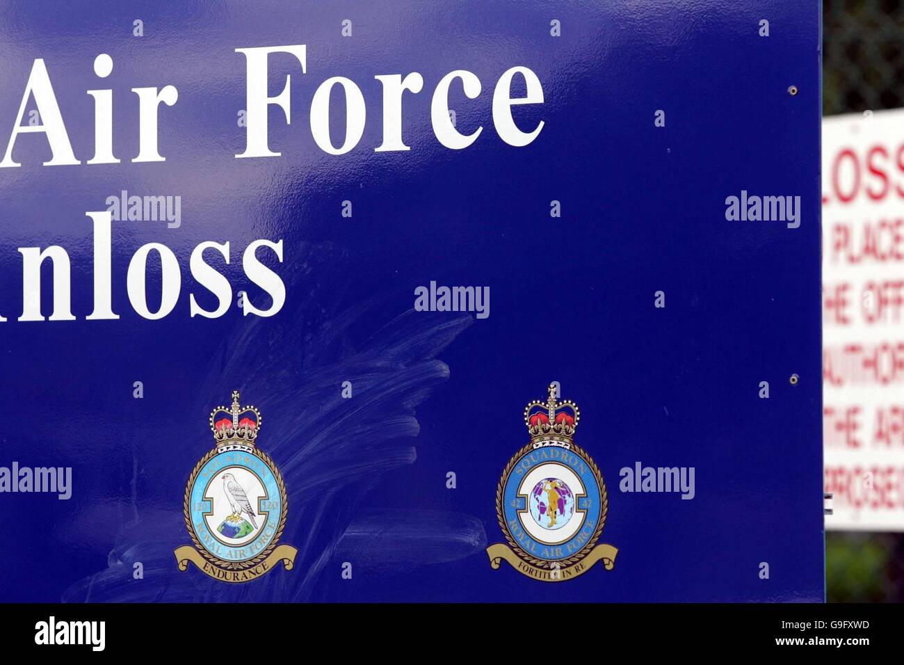 A sign showing the 120 Squadron insignia (left) at the RAF Kinloss base ...