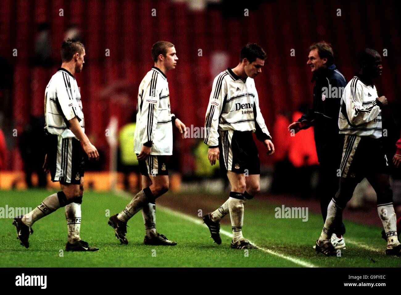 (L-R) Fulham's Lee Clark, Sean Davis and Steve Finnan trudge off the ...