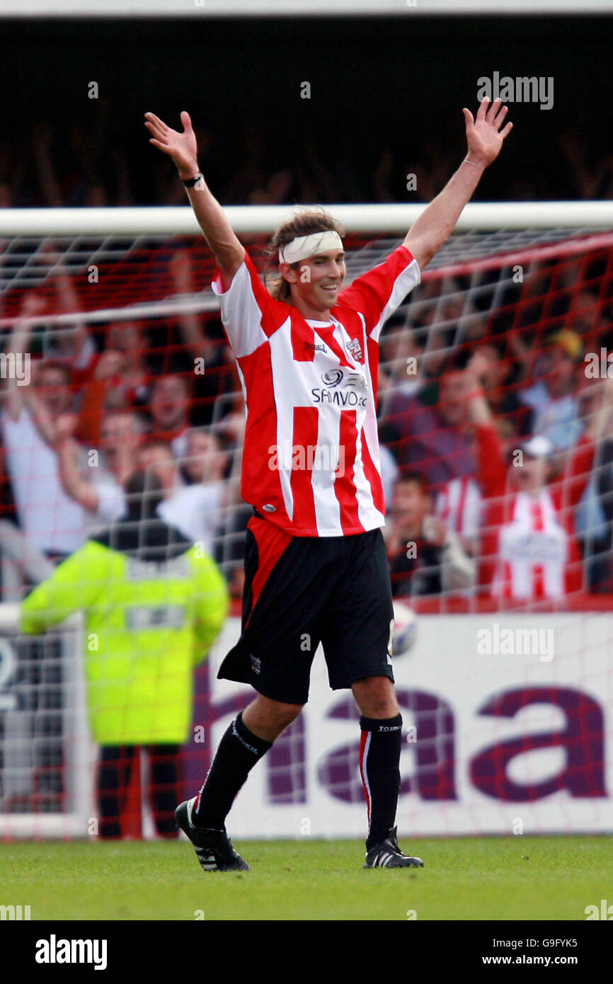 Brentford's Adam Griffiths celebrates after his team mate Jo Kuffour ...