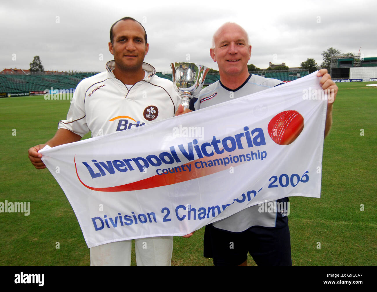 Surrey's captain Mark Butcher celebrates with coach Alan Butcher Stock ...