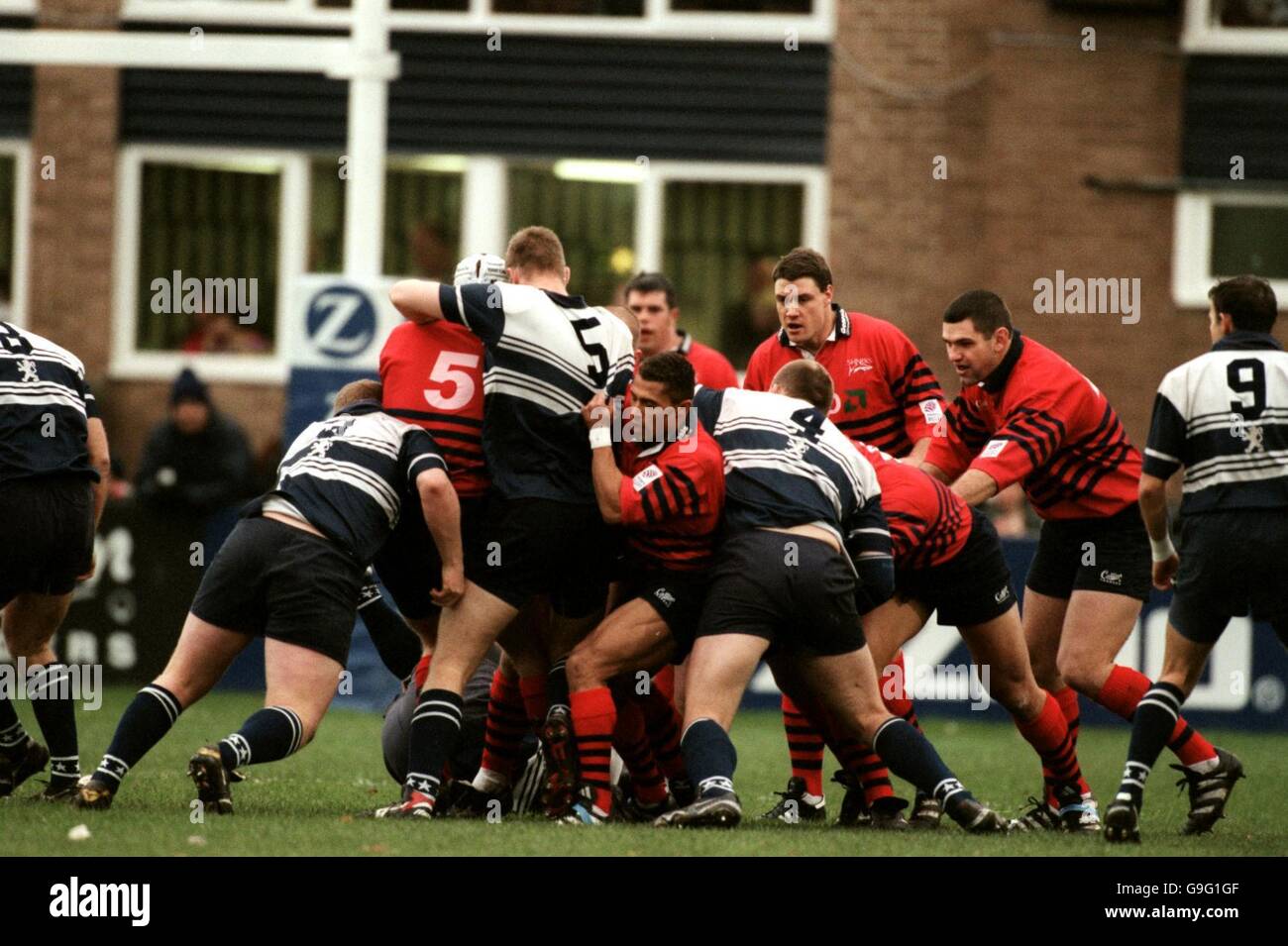 Sale Sharks' Jason Robinson (c) gets trapped between Coventry's Robbie ...