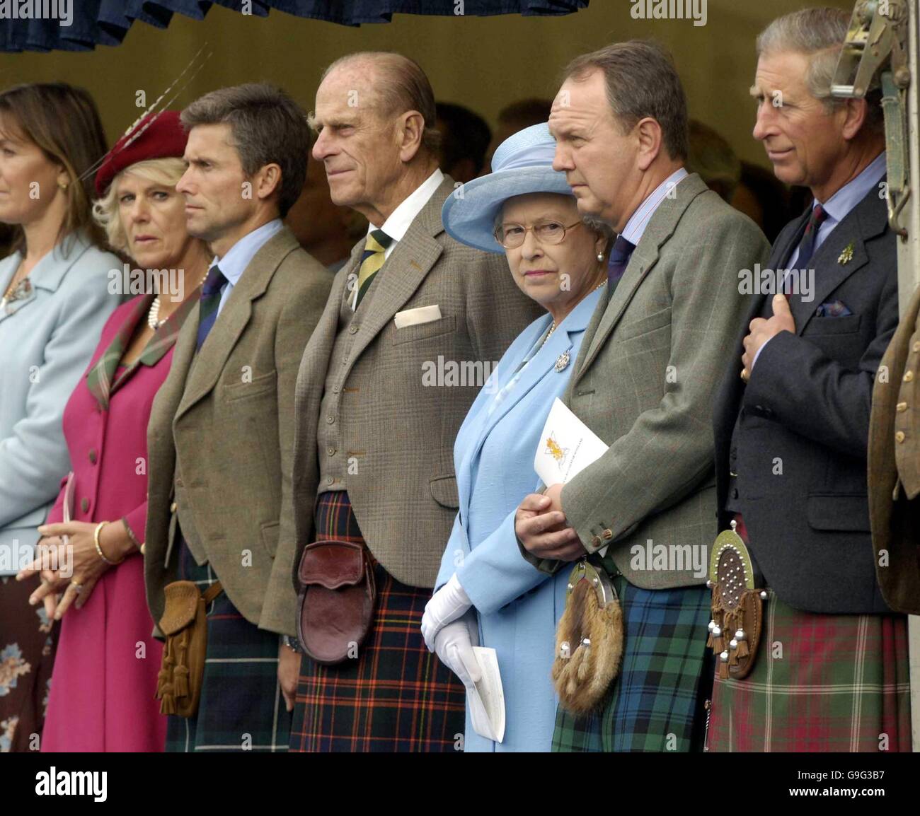 Britain's Queen Elizabeth II stands with other members of the Royal ...