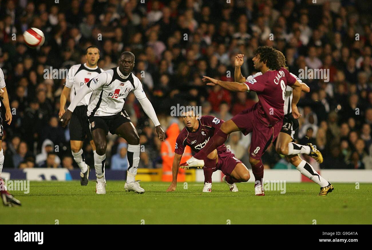 Fulham's Jimmy Bullard is fouled by Bolton Wanderers'Ivan Campo Stock ...