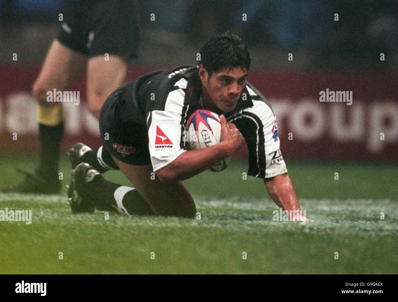 New Zealand's Stephen Kearney goes over for their first try of the game ...
