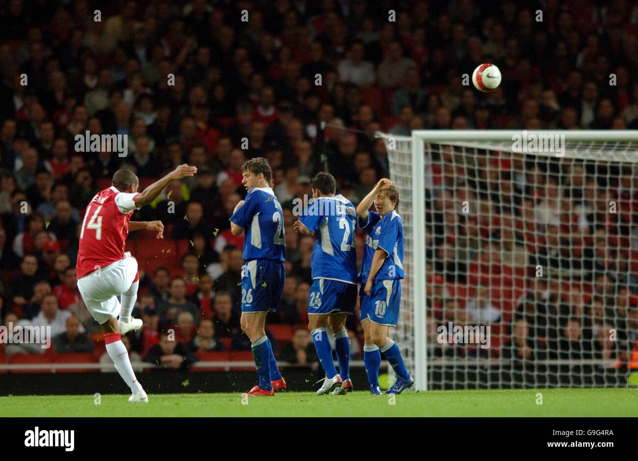 Free kick towards goal hi-res stock photography and images - Alamy