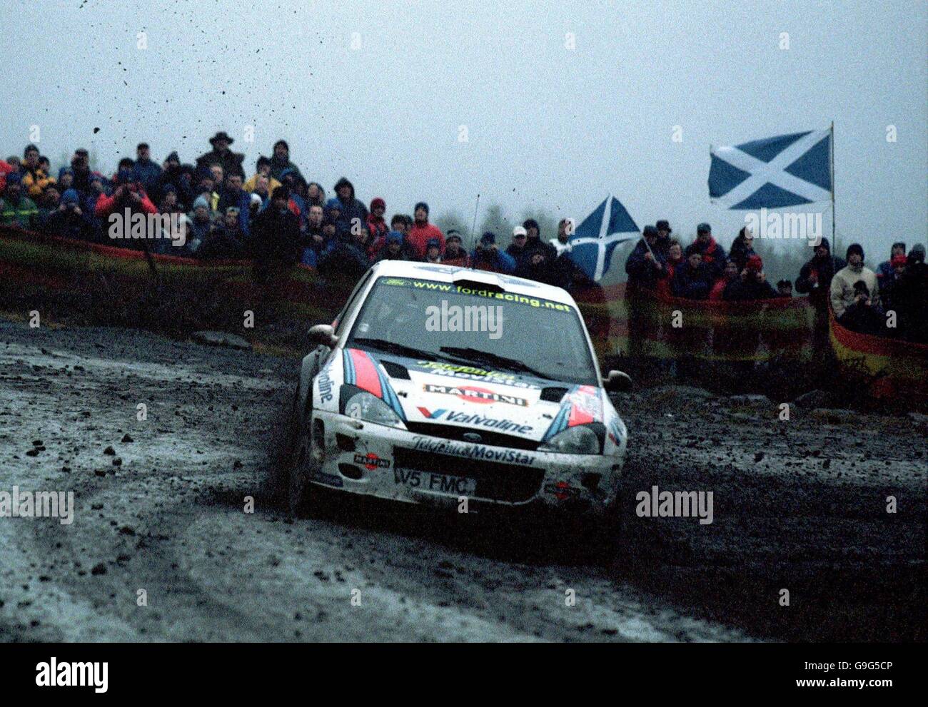 Colin mcrae braves the conditions in stage 9 hi-res stock photography ...