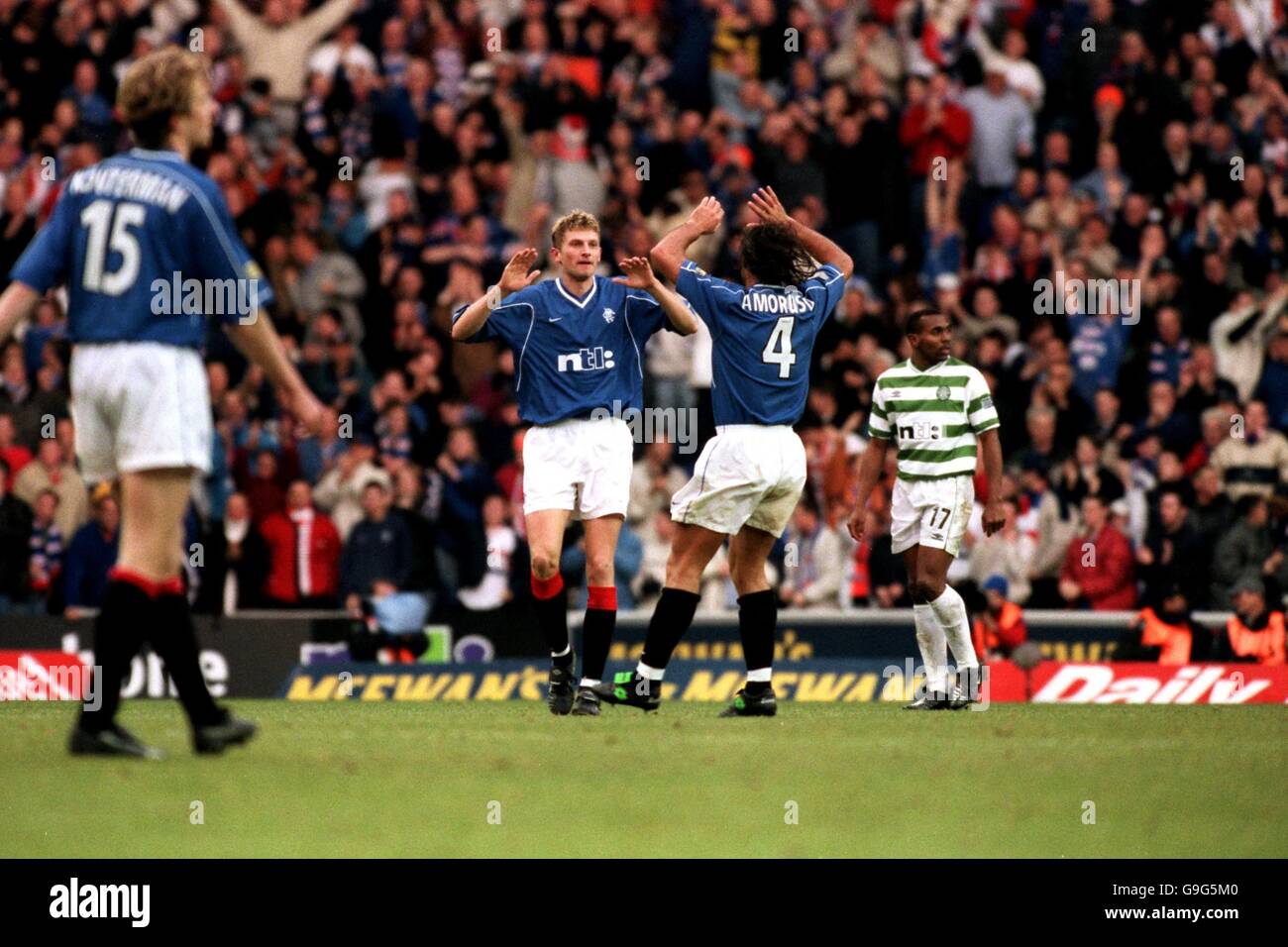 Rangers' Tore Andre Flo (l) is congratulated by fellow scorer Lorenzo ...