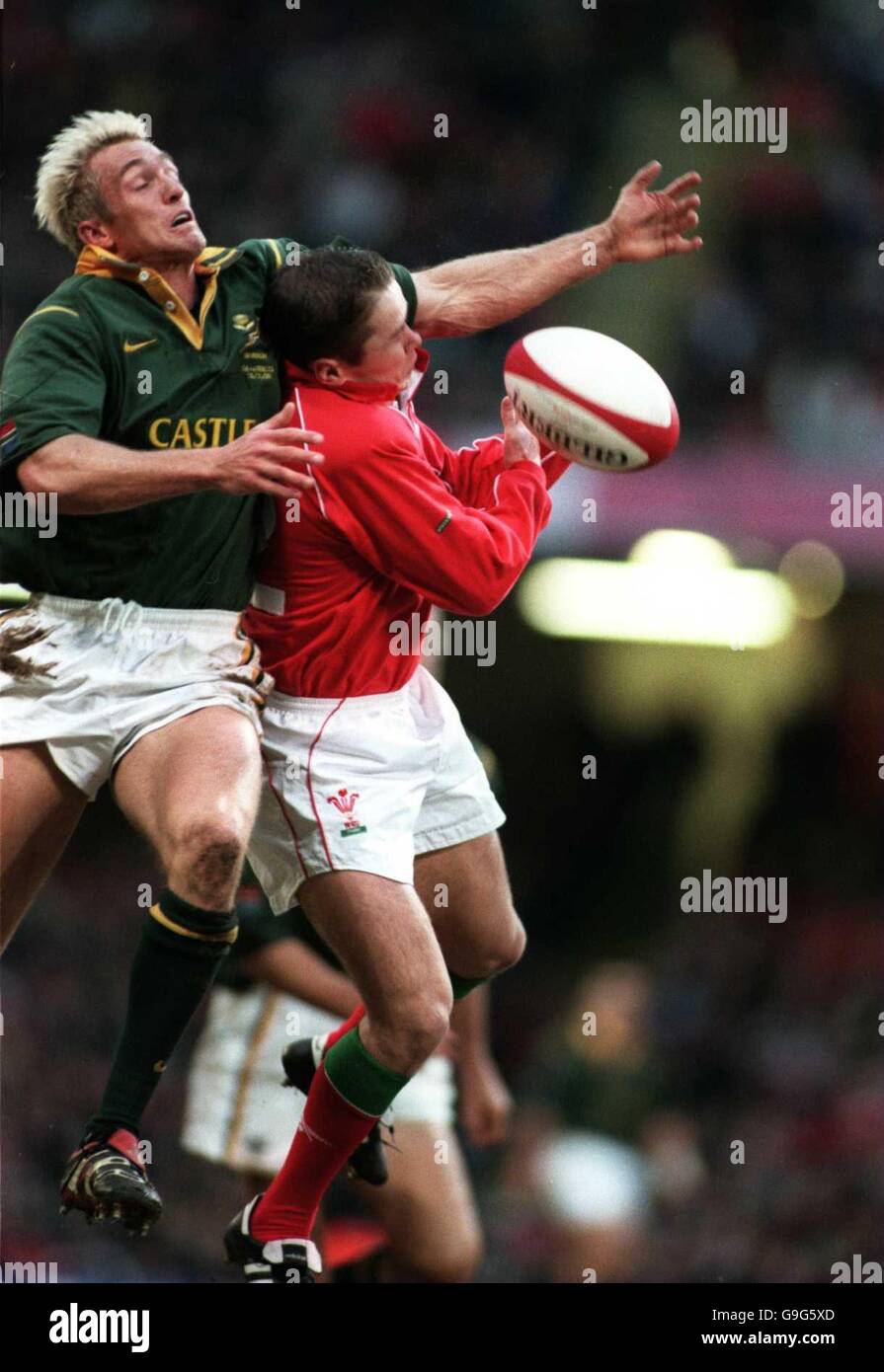 Wales rhys williams r jumps south africas percy montgomery l hi-res ...