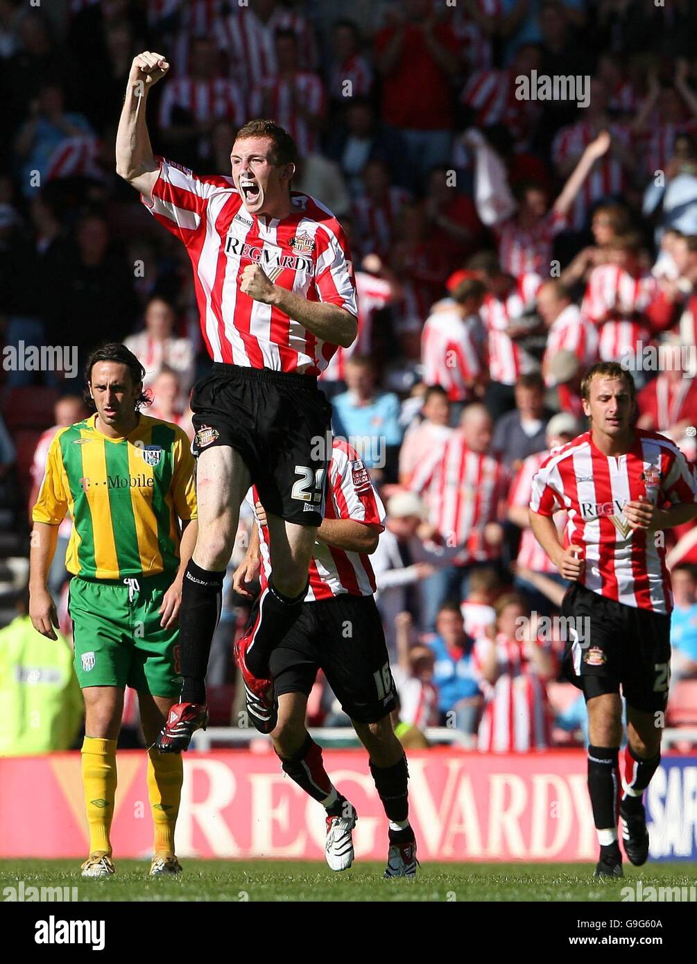 Sunderland's Neil Collins celebrates scoring during the Coca-Cola ...