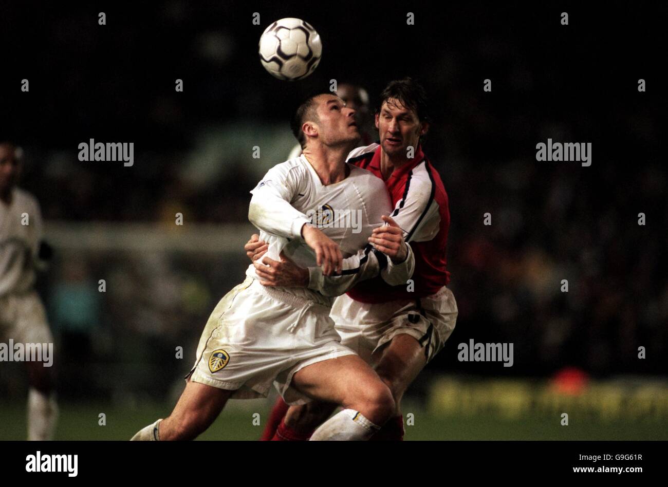 Leeds uniteds mark viduka is manhandled by arsenals tony adams hi-res ...