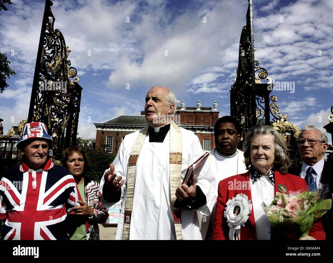 Father Frank Gelli, from London, holds small service at the gates of ...