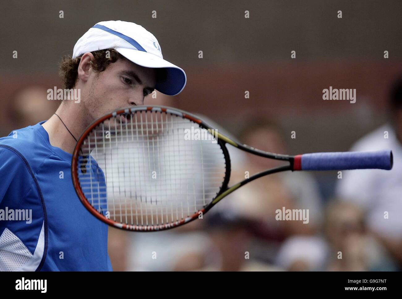Great Britain's Andy Murray throws his racket during the third round ...
