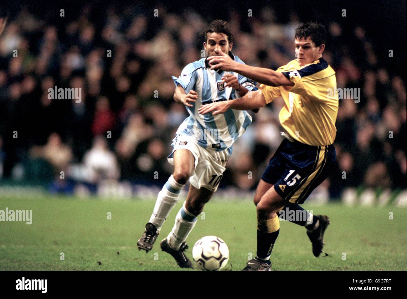 (L-R) Coventry City's Moustapha Hadji battles for possession of the ...