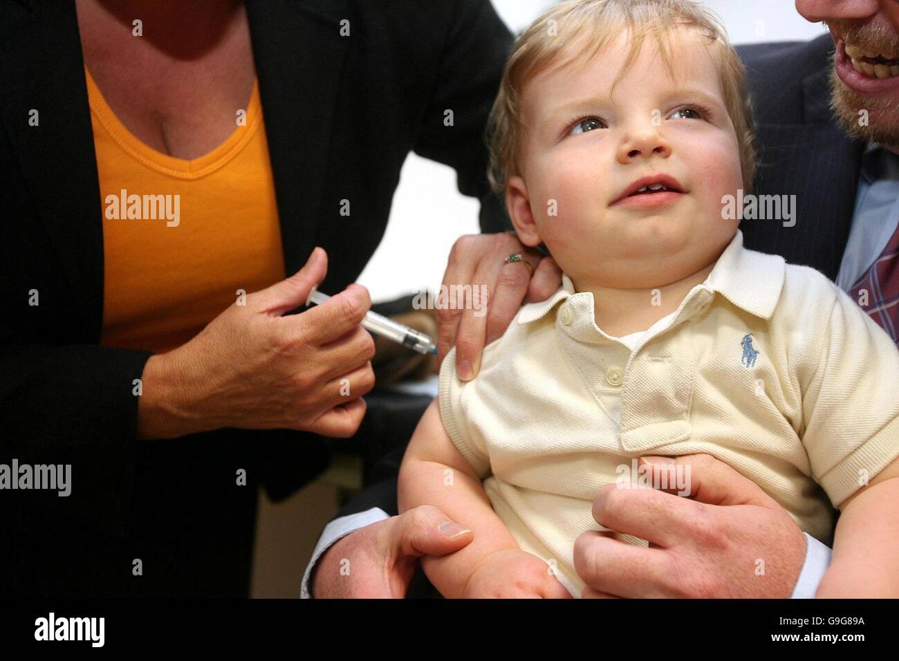 (Left to right) Dr O'Hare from Belfast, with baby Gabriel McConkey and ...