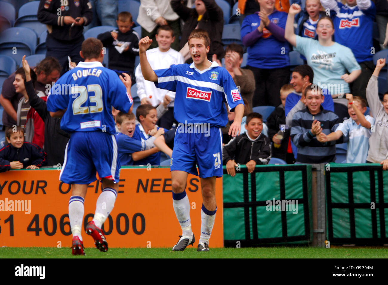 Stockport County's Michael Bowler celebrates with goalscorer Glenn ...