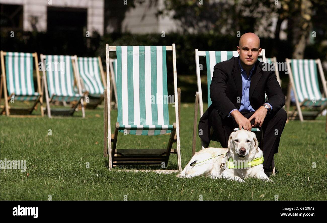 Larry, the golden retriever labrador cross with his owner Mark Pollock ...