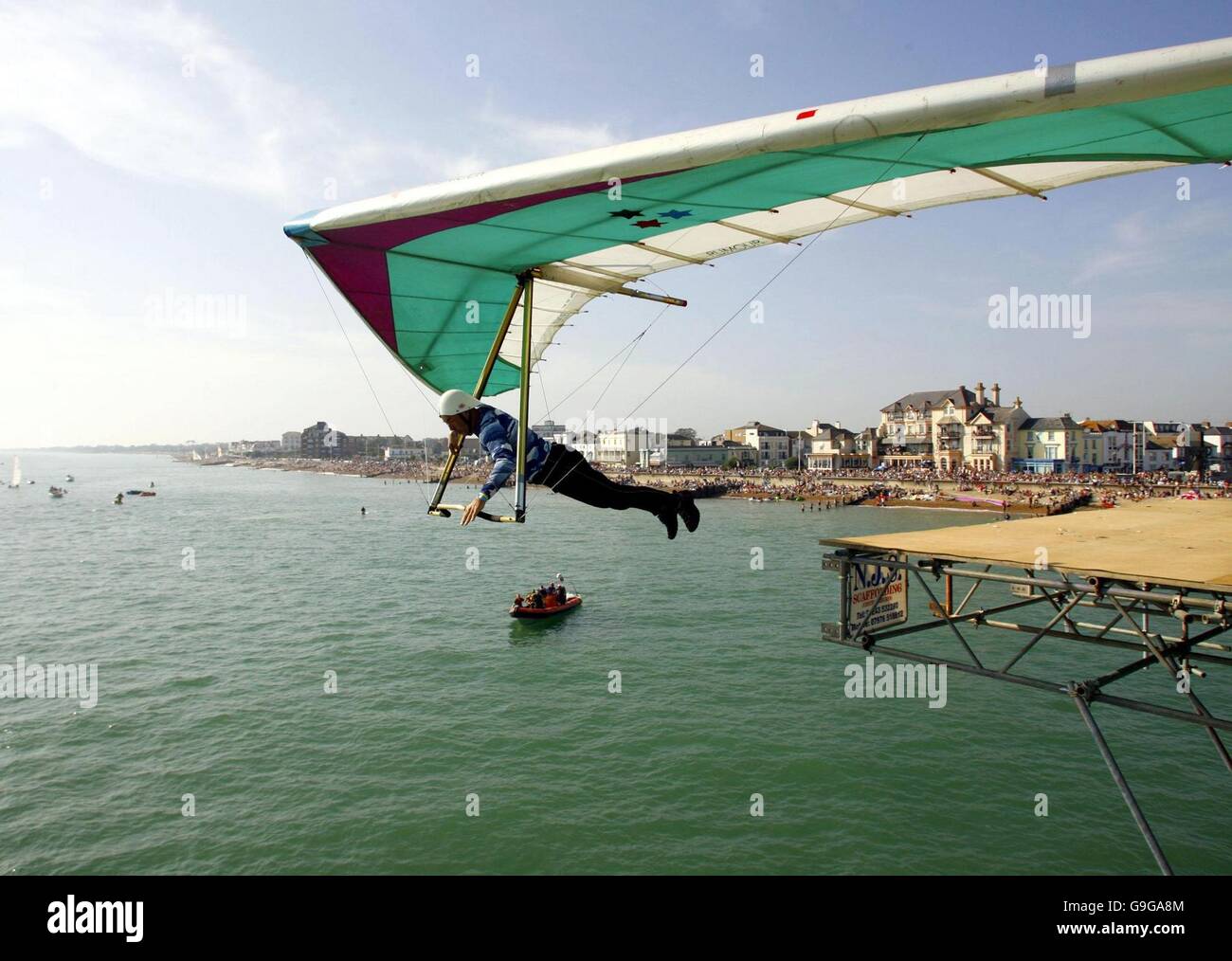 Ron Freeman, from Newcastle, launches himself from the pier during the ...