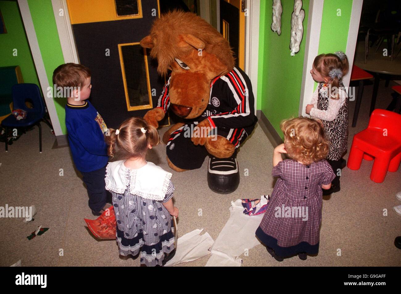 Middlesbrough mascot Roary the Lion with a group of poorly children who ...