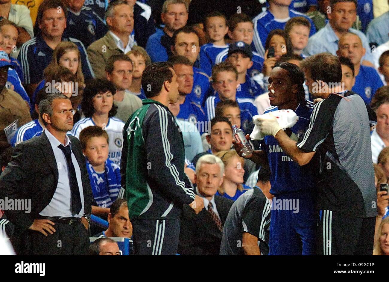 Chelsea's Didier Drogba receives treatment on his nose during the UEFA ...