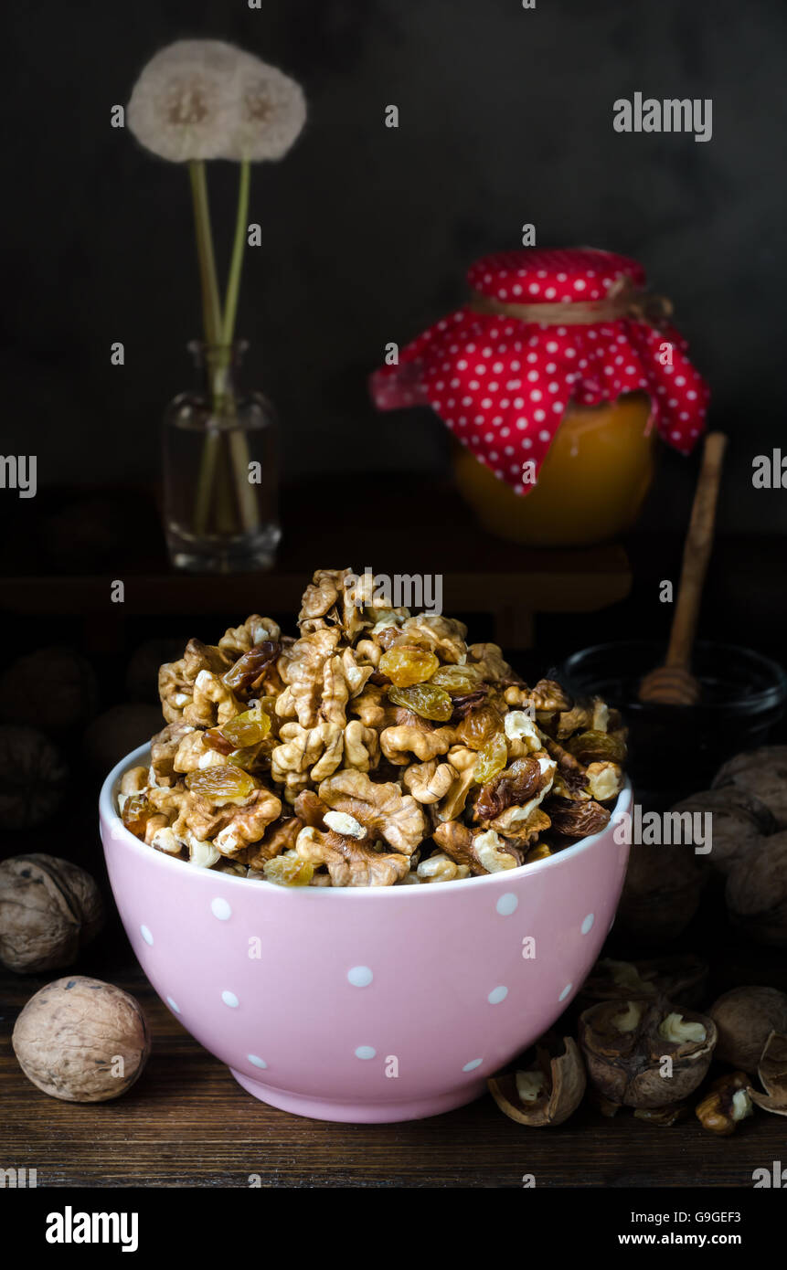 Bowl with walnut, still life dark photo Stock Photo - Alamy