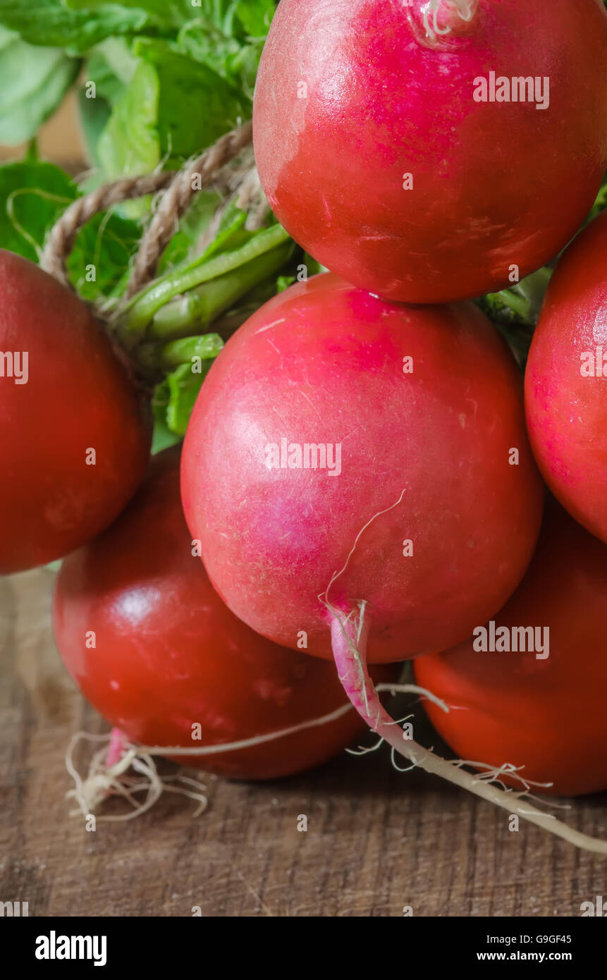 Beautiful organic radish on wooden background closeup Stock Photo - Alamy