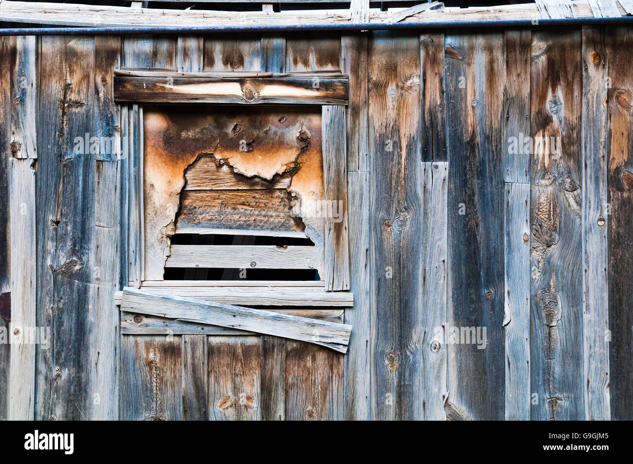 Boarded up window on an old wooden shack Stock Photo - Alamy