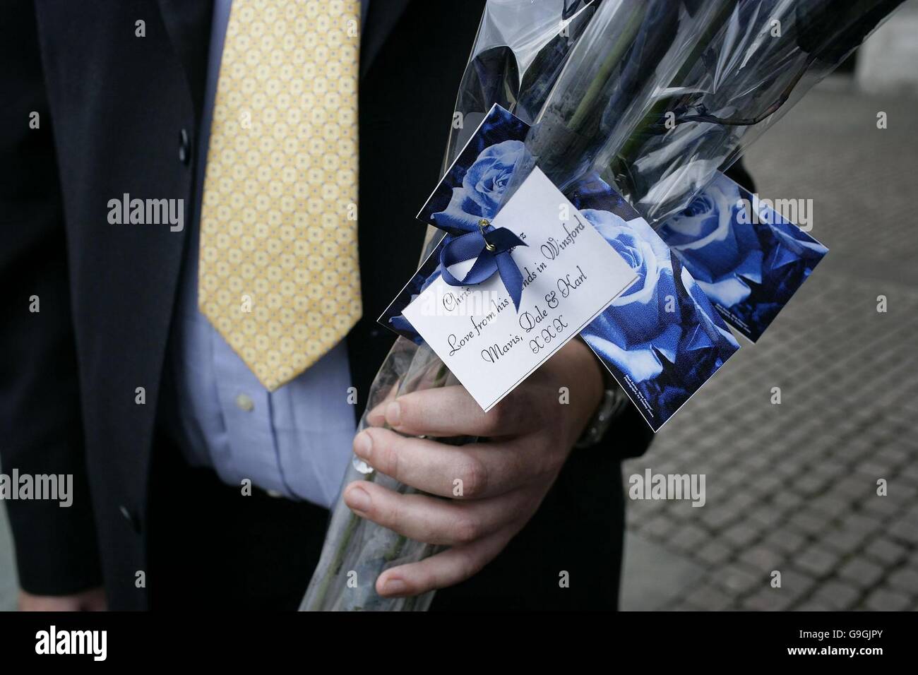 Neil Manser holds a flower for his father who fell victim to the MRSA ...