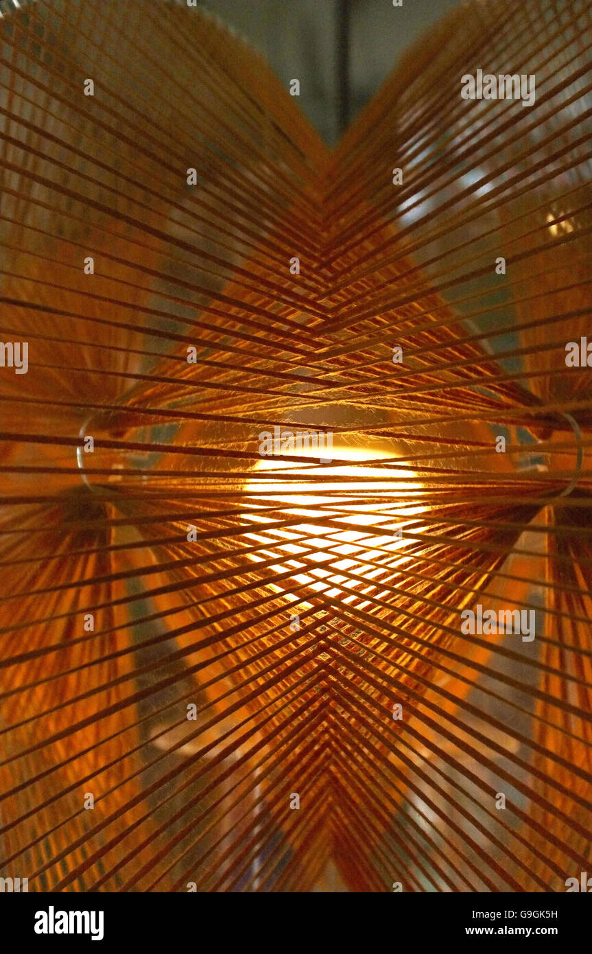 Abstract of various strings with yellow lighting Stock Photo - Alamy