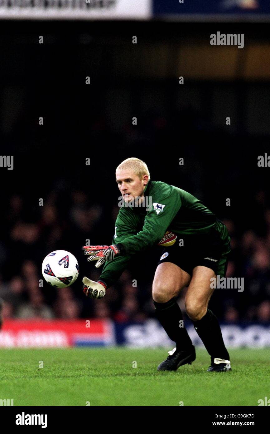 Leicester City goalkeeper Simon Royce bends down to field a bouncing ...