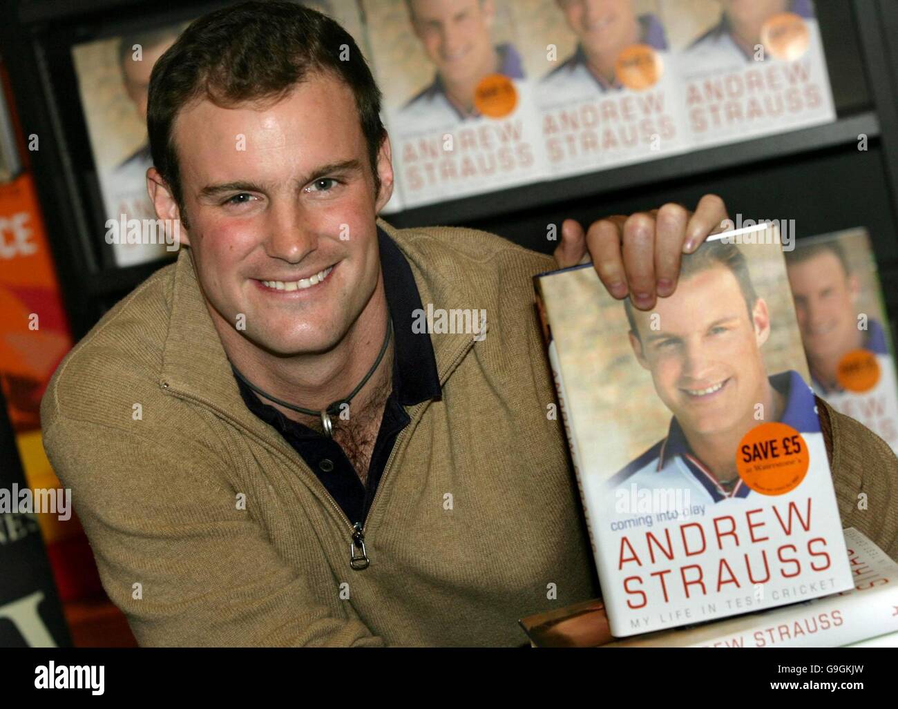 England batsman Andrew Strauss poses for the media with his new book ...