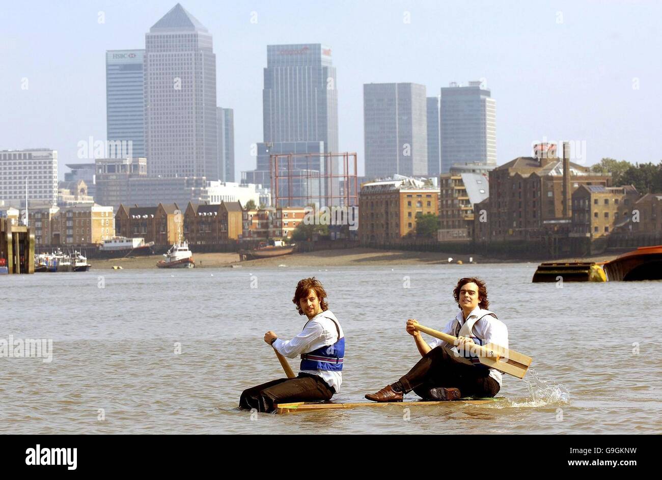 David Cameron (right) and Toby Hadden paddle their dining Table/Raft ...