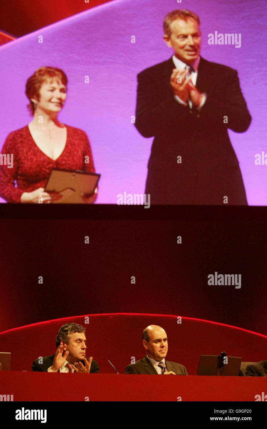Britain's Prime Minister Tony Blair and Hazel Blears are watched on ...