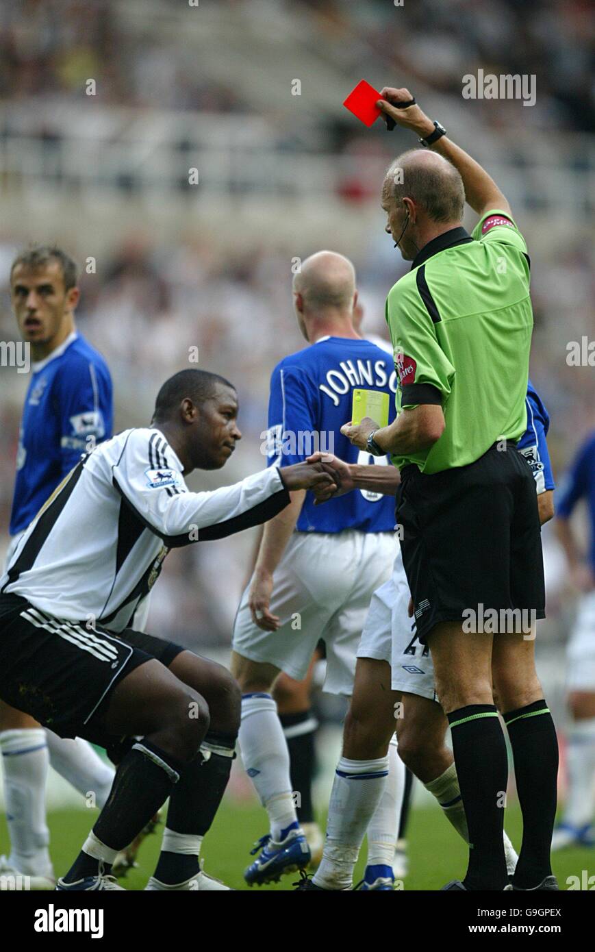 Referee Steve Bennett sends off Newcastle United's Titus Bramble (l ...