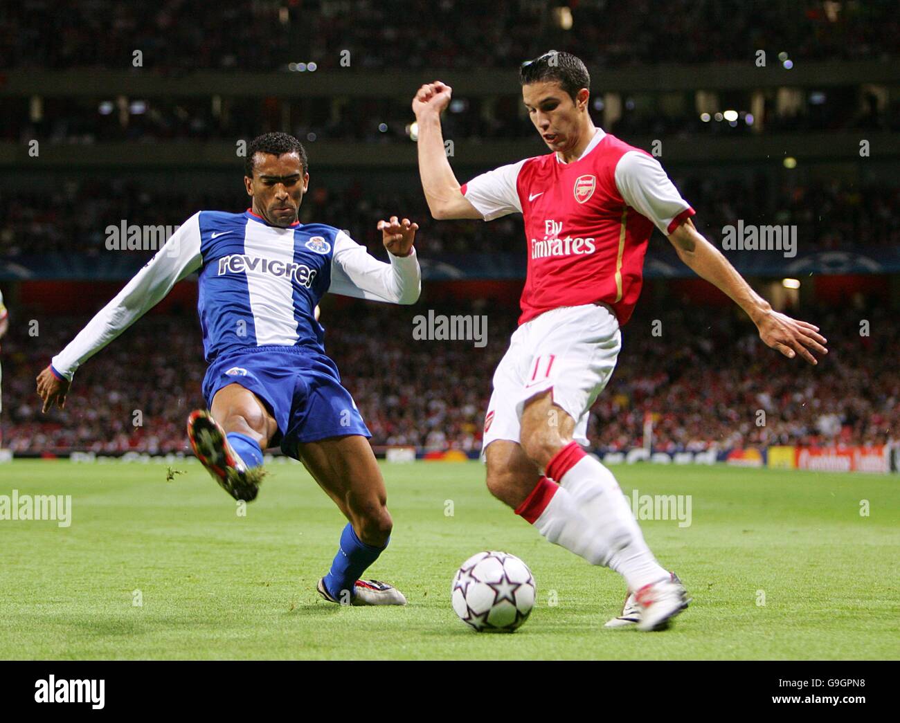 Fc portos jose bosingwa and arsenals robin van persie hi-res stock ...