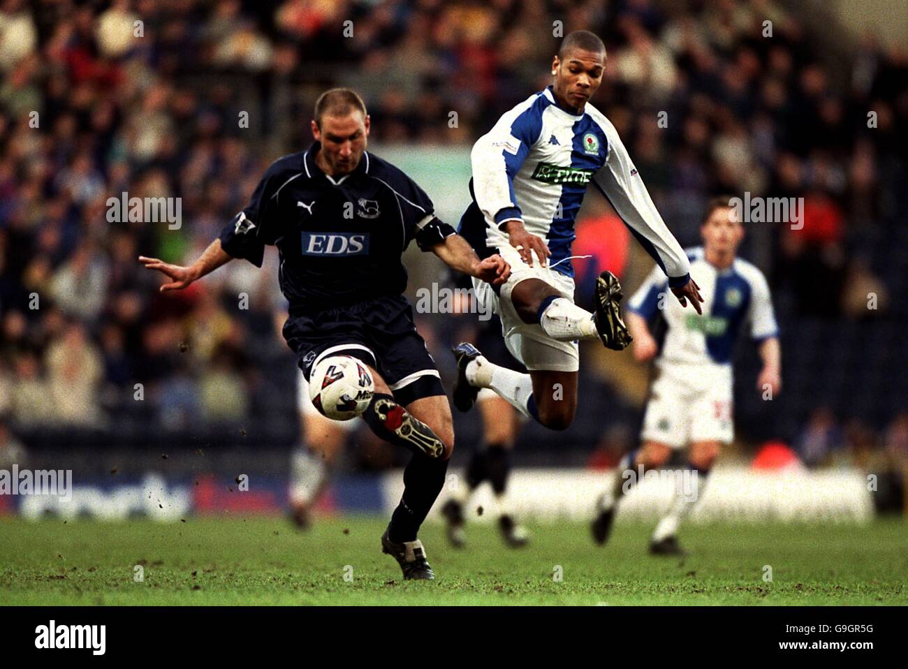 Blackburn Rovers' Marcus Bent (R) and Derby County's captain Horacio ...
