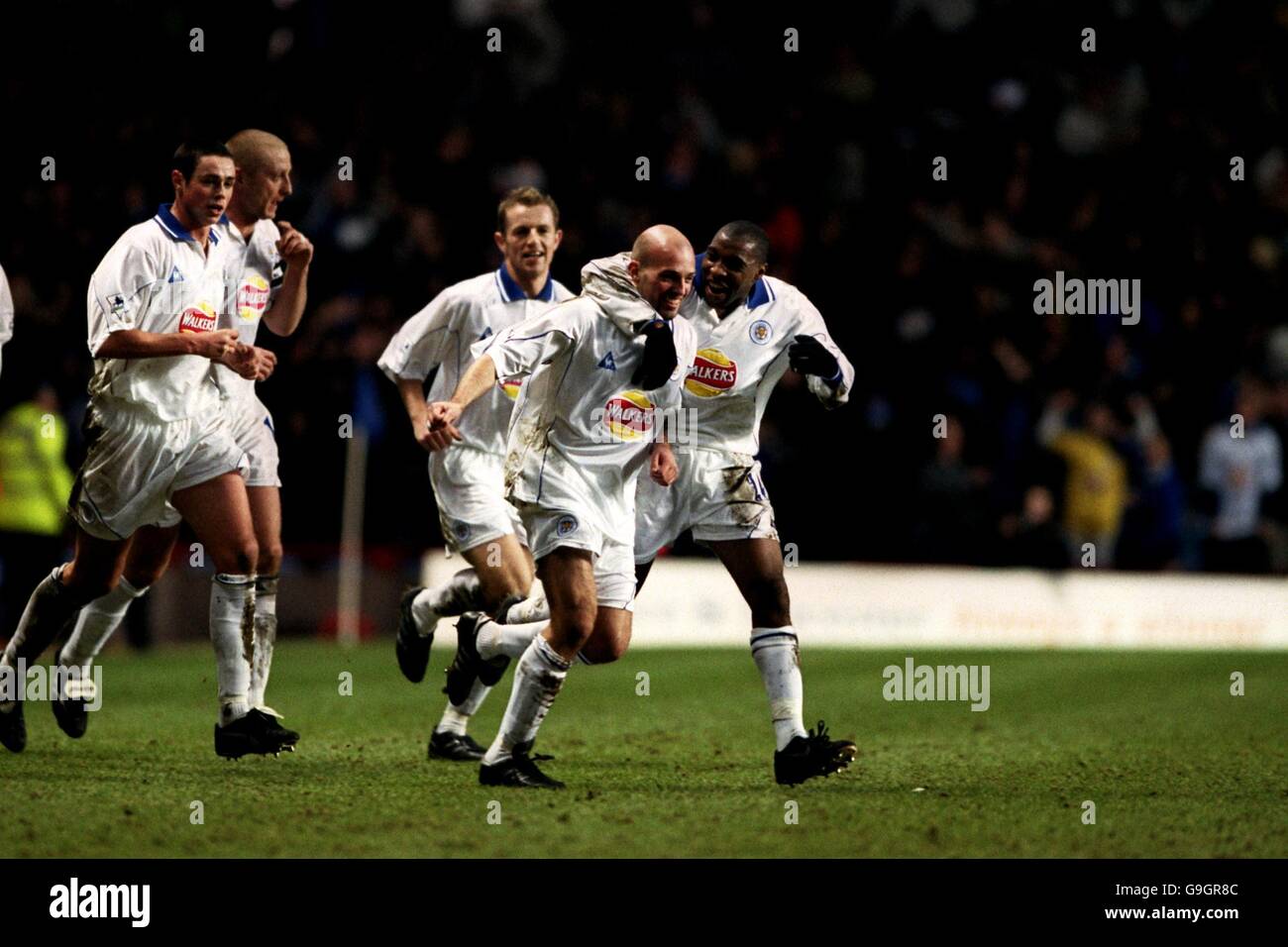 Leicester City's Arnar Gunnlaugsson is congratulated by Andrew Impey (R ...