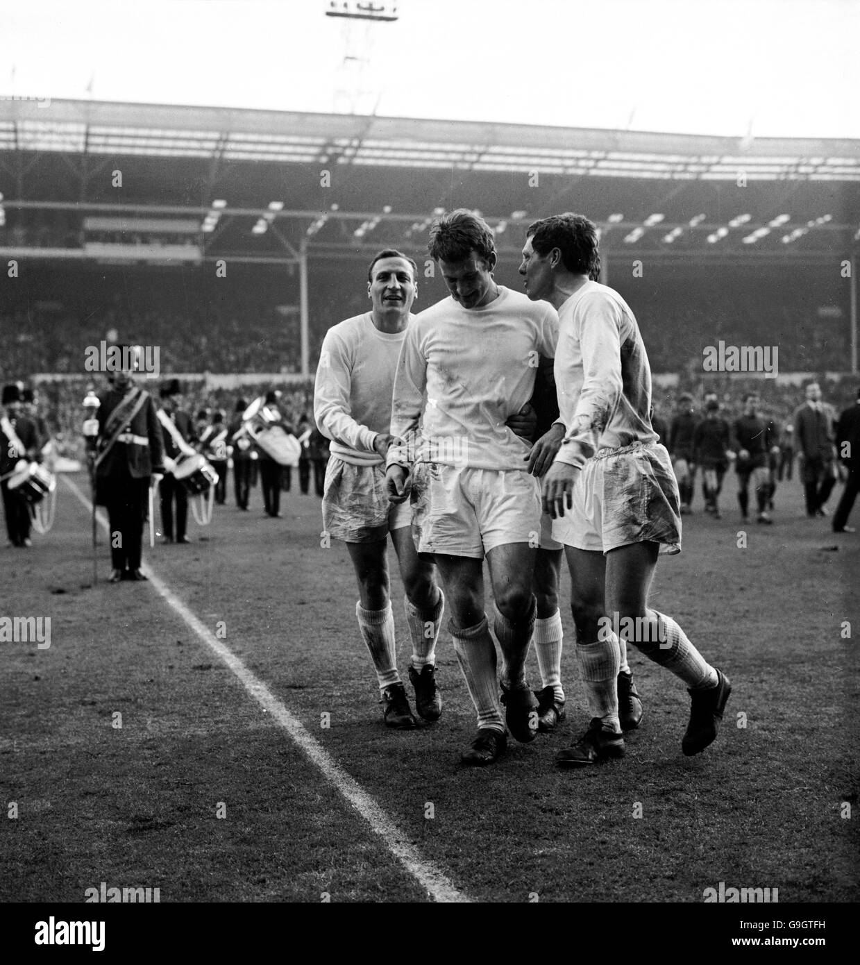 Queens Park Rangers' Rodney Marsh (c), scorer of their second goal ...