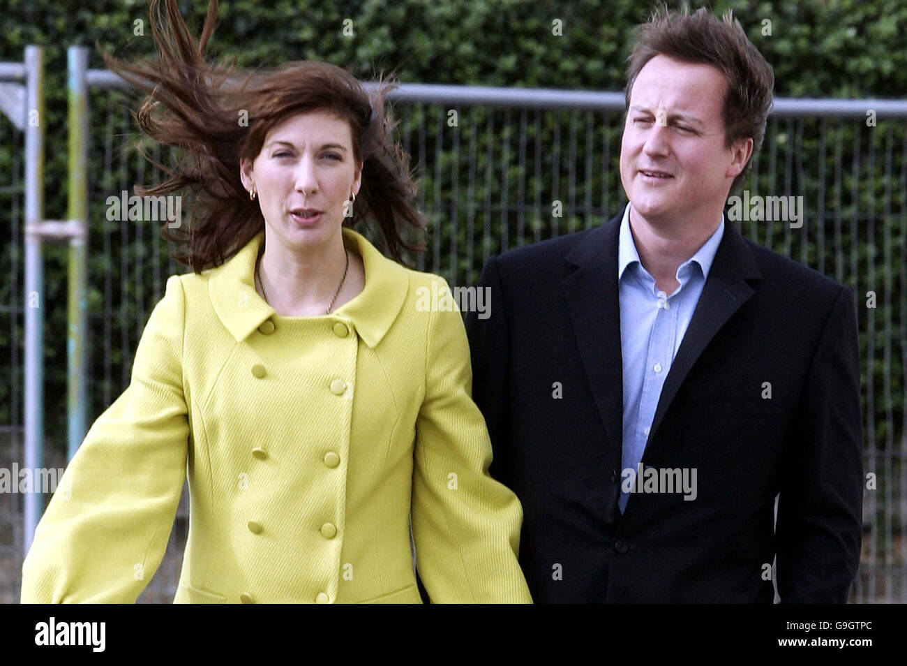 Conservative Party leader David Cameron arrives with his wife Samantha ...