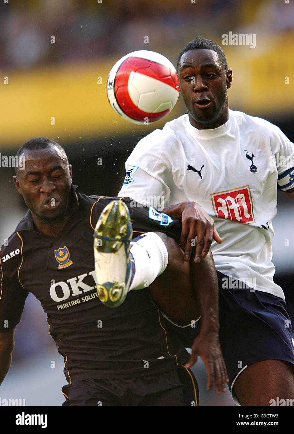 (R-L) Tottenham Hotspur's Ledley King and Portsmouth's Lomana Tresor ...